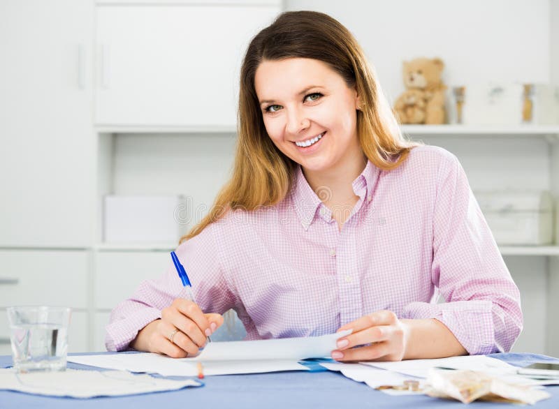 Young Female Preparing Agreement Papers Stock Photo - Image of deciding ...