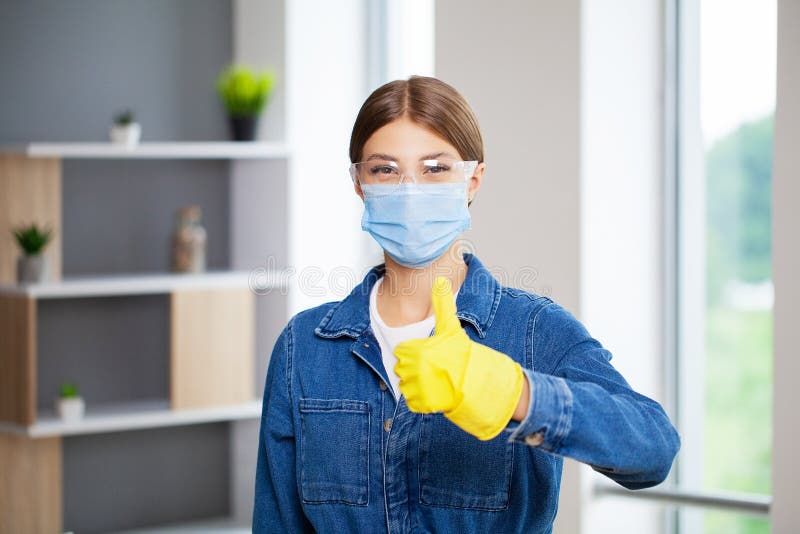 A Young Female Professional Cleaner Cleans a Modern Office Stock Photo ...