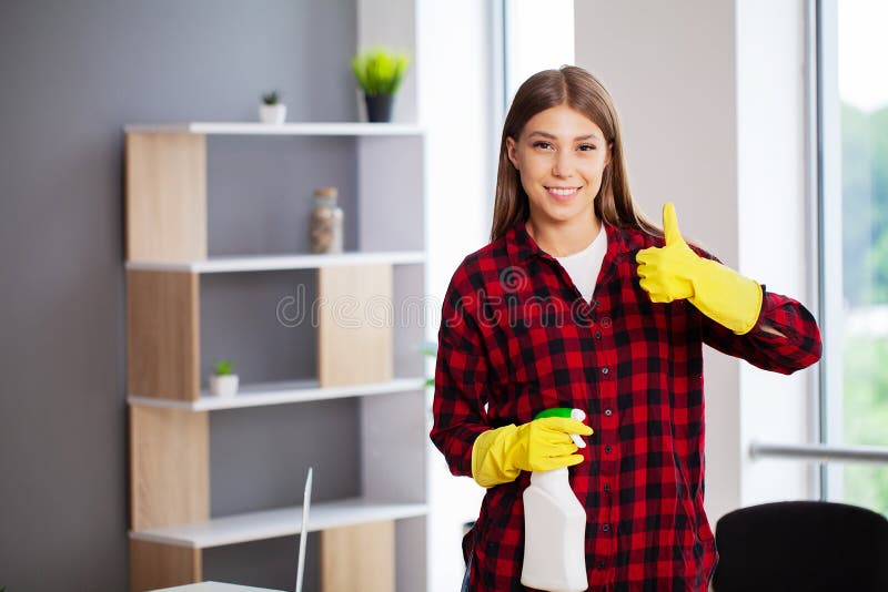 A Young Female Professional Cleaner Cleans a Modern Office Stock Photo ...