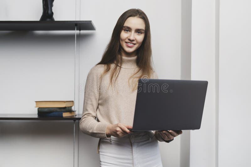 Young Female Professional Working on Laptop, Executing Corporate ...