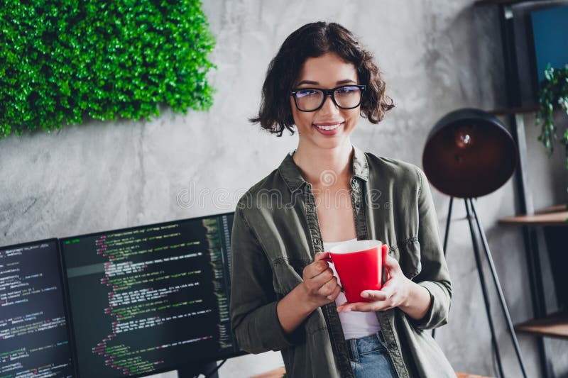 Young Female Programmer Enjoying a Coffee Break in Her Stylish ...