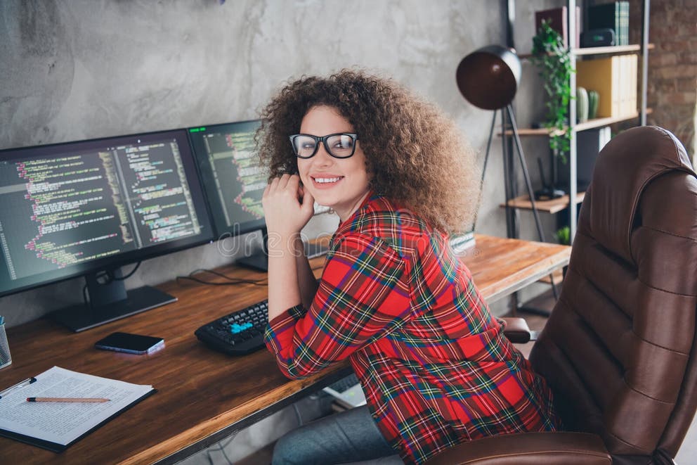 Young Female Programmer Working in a Home Office, Smiling at the Camera ...