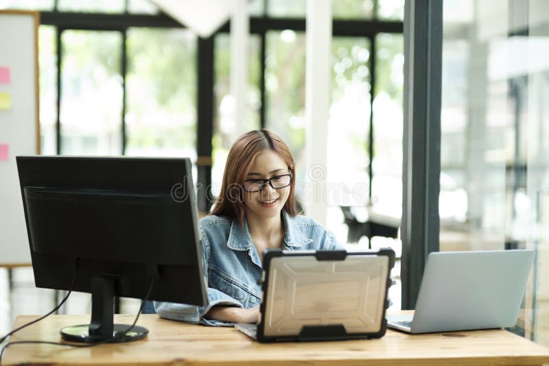 Young Female Programmer Working on Laptops. Stock Photo - Image of ... Young Female Programmer Working on Laptops. Stock Photo - Image of ...
