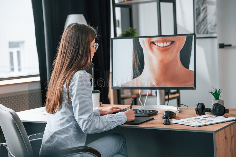 Young Female Retoucher Working with Computer and Graphic Tablet Stock ...