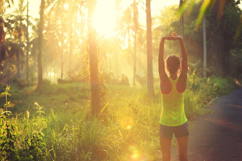 Runner Warming Up before Running at Morning Forest Trail Stock Photo ...