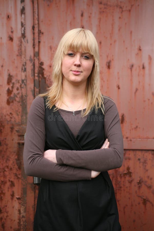 Young Female on Rusty Background Stock Photo - Image of blonde, happy ...