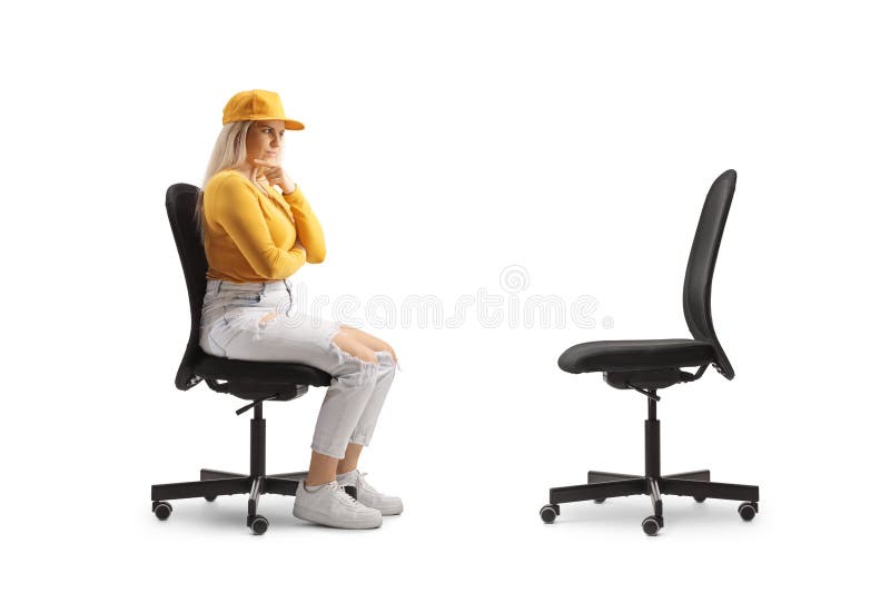 Young Female Sitting in an Office Chair and Looking at an Empty Chair ...