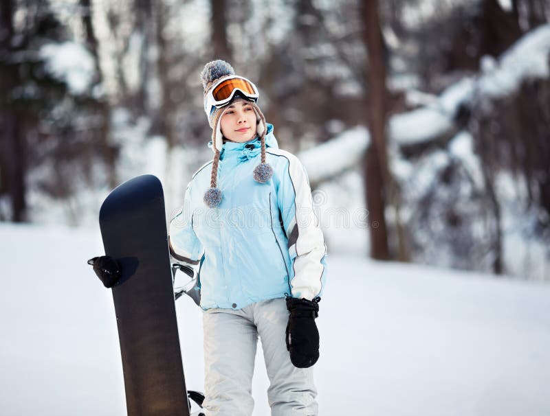 Young female snowboarder stock photo. Image of activity - 27467700