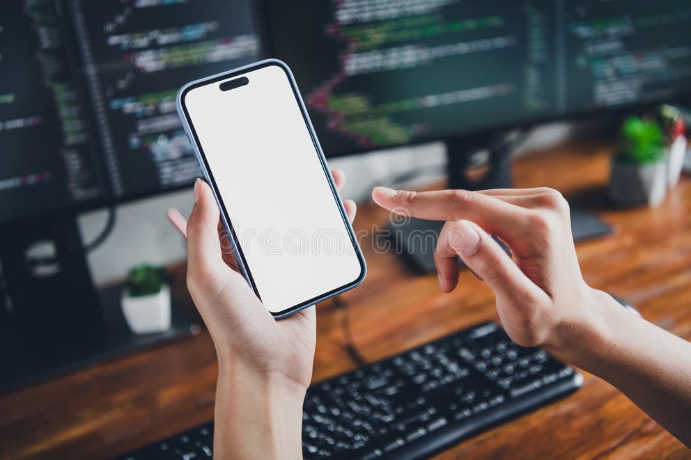 Young Female Software Developer Using Smartphone for Coding in Modern ...