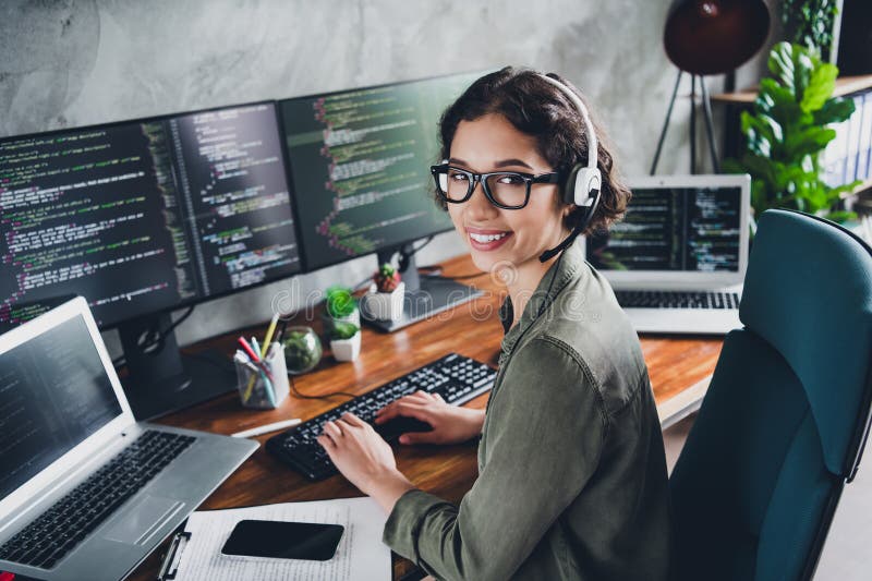 Young Female Software Developer Working Remotely on a Programming ...