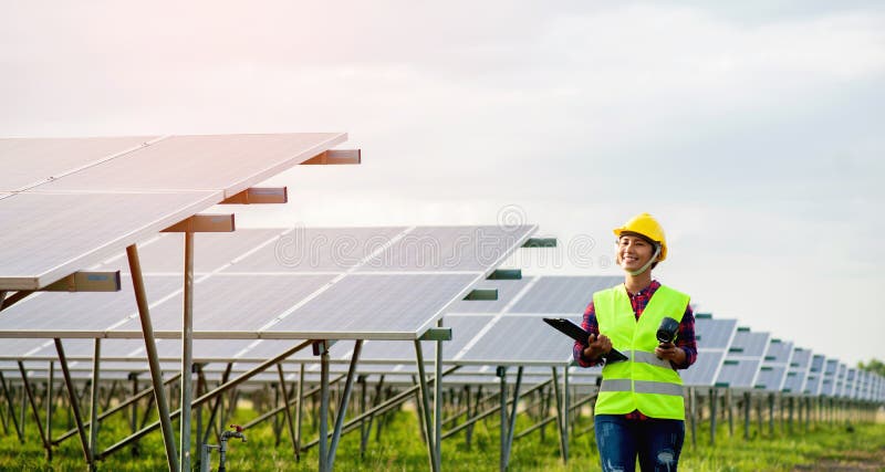 Young Female Solar Cell Engineer is Working Hard. Working in ...