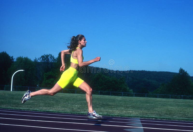 Female Sprinter in the Starting Blocks from Behind Editorial Stock ...