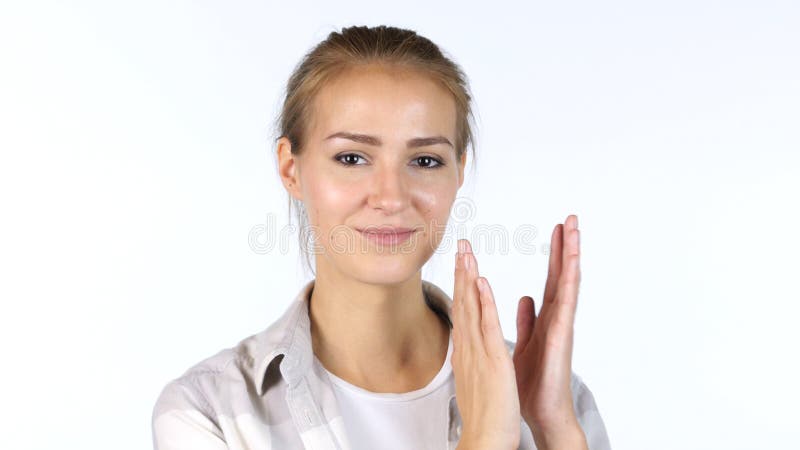 Young Female Student Clapping in Front of White Background Stock Photo ...