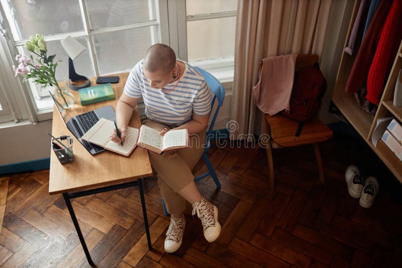 Young Female Student Doing Homework in Dorm Room Stock Photo - Image of ...