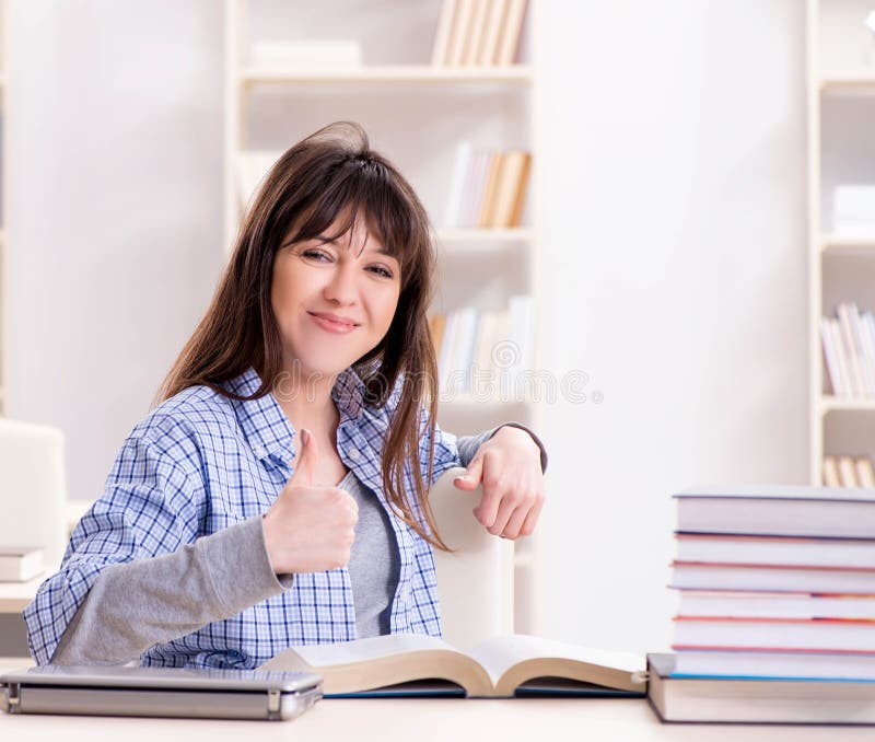Young Female Student in Educational Concept Stock Photo - Image of ...