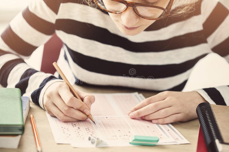 Young Female Student in Examination Stock Image - Image of form, sheet ...