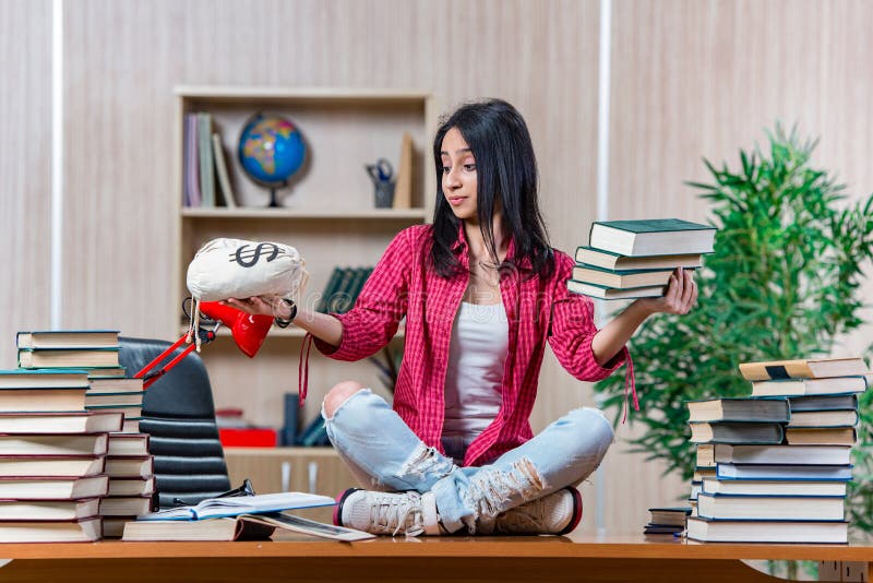 The Young Female Student Preparing for College School Exams Stock Photo ...