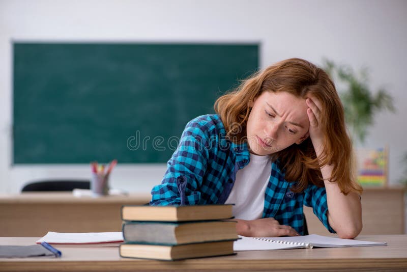 Young Female Student Preparing for Exam in the Classroom Stock Photo ...