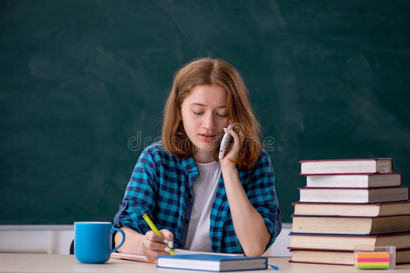Young Female Student Preparing for Exams in the Classroom Stock Photo ...