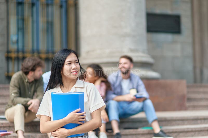 Young Female Student Standing in Front of the University Building ...