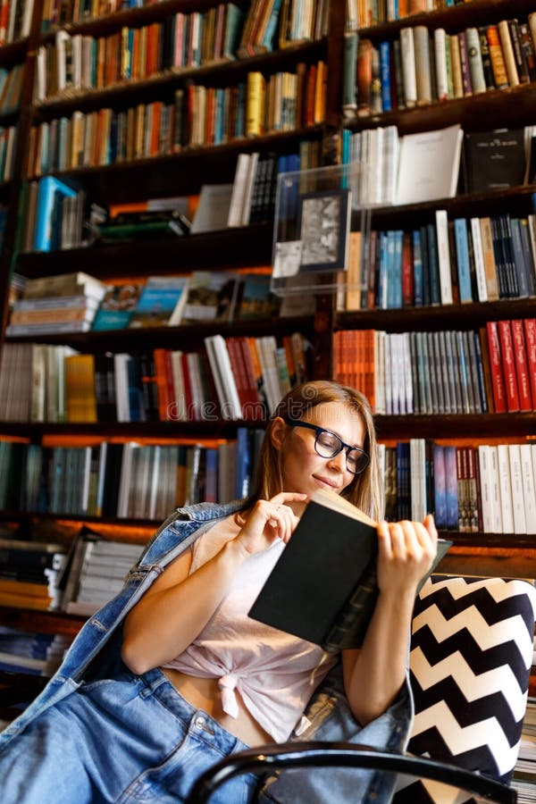 Young Female Student Study in the Library Holding Book , Education ...