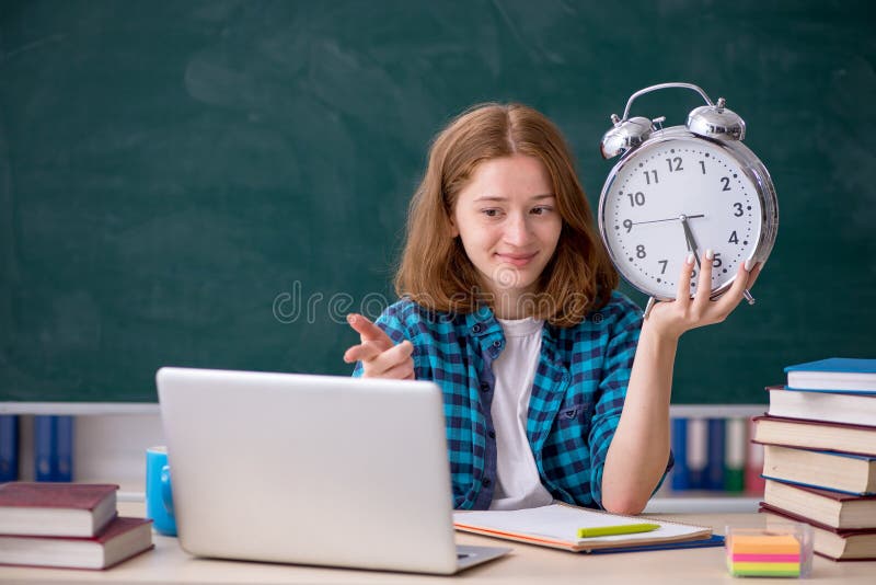 Young Female Student in Time Management Concept Stock Image - Image of ...