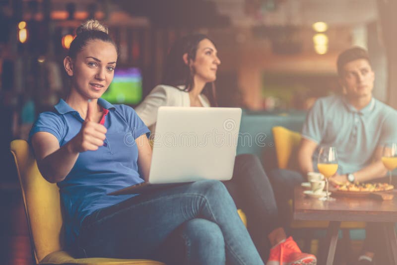 Young Female Student is Using Laptop Computer in Cafe Stock Image ...