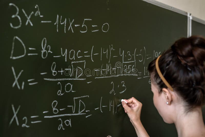 Young Female Student Written Math Formulas on the Chalkboard Stock ...
