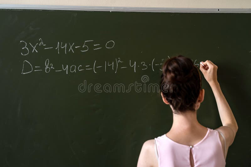 Young Female Student Written Math Formulas on the Chalkboard Stock ...