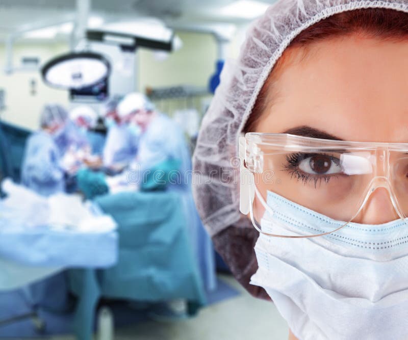 Young Female Surgeon with Medical Team Stock Image - Image of disease ...