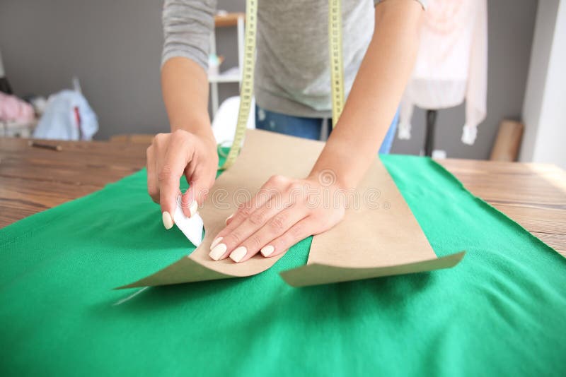 Young Female Tailor Working with Sewing Pattern in Atelier Stock Image ...
