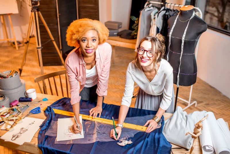 Young Female Tailors Working with Clothes Stock Image - Image of ...