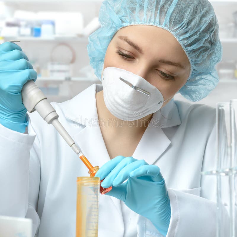 Female Scientist or Tech in Lab Coat, Gloves and Hat Holds Liqui Stock ...