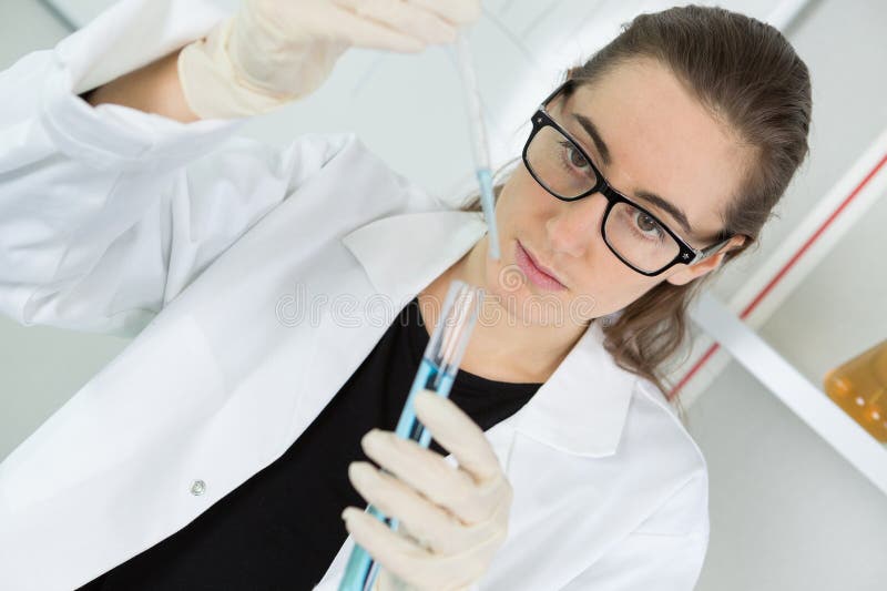 Young Female Tech Scientist Performs Protein Assay Stock Photos - Free ...