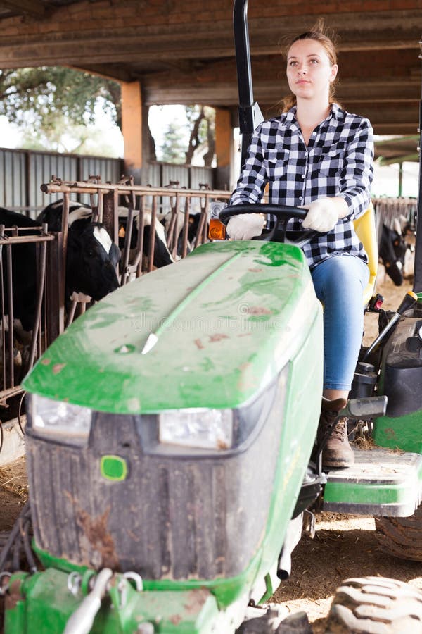 Female Farmer Working on Tractor Stock Image - Image of truck, aids ...