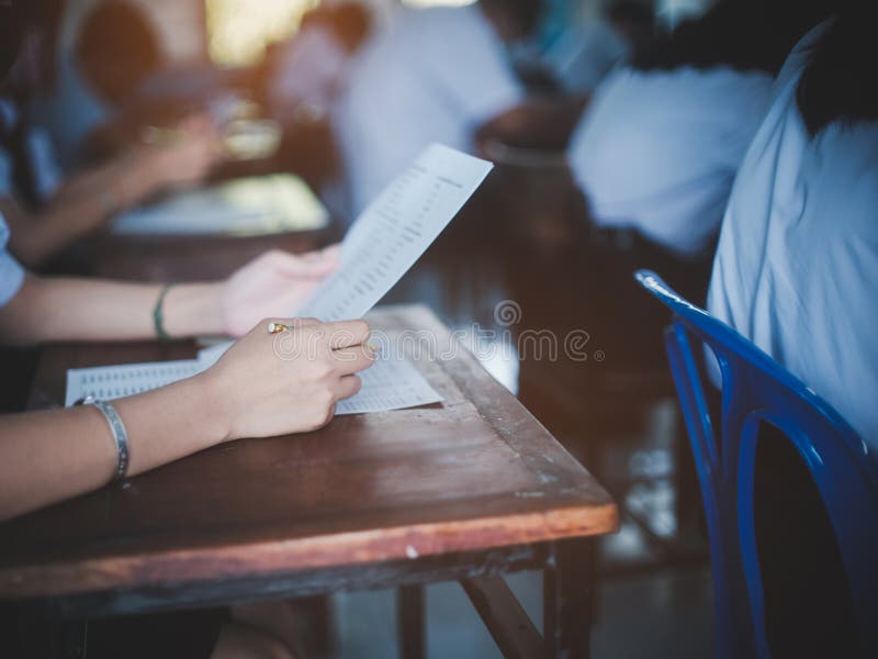 Young Female Uniform Student Taking Exam at School with Stress Stock ...