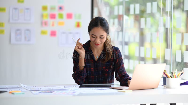 Female UX Designer Working for Mobile Application Software Design at ...