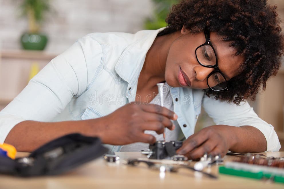 Young Female Working on Assembling Circuit Components Stock Image ...