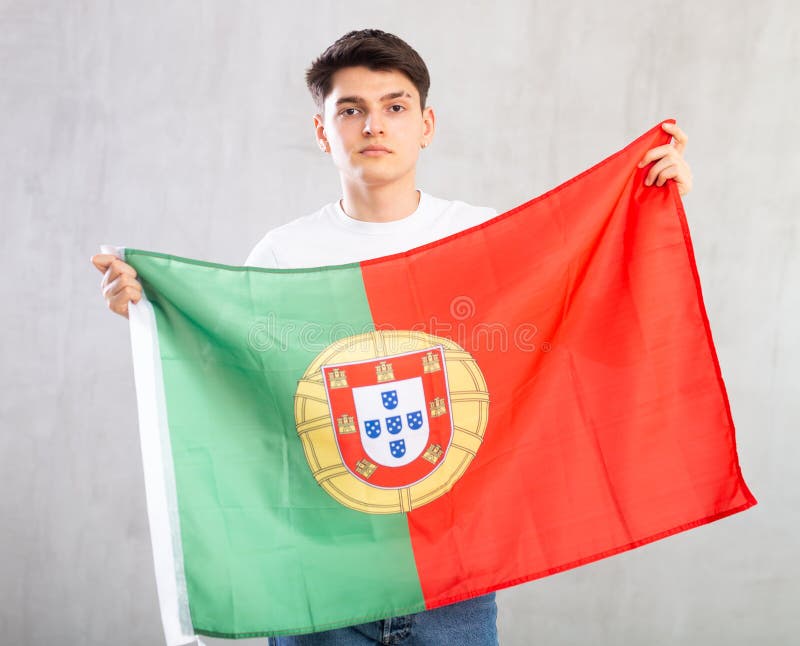 Focused Young Guy Holding Flag of Portugal Stock Image - Image of hold ...