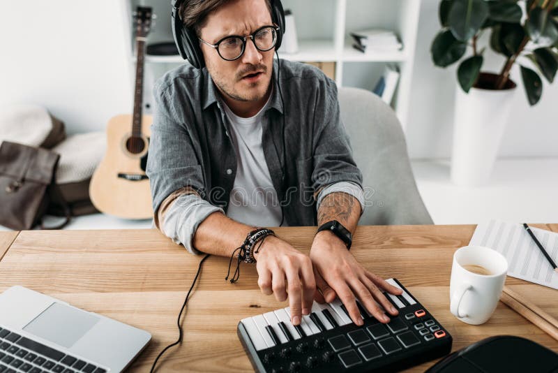 Man playing on MPC pad stock photo. Image of male, energy - 102926894