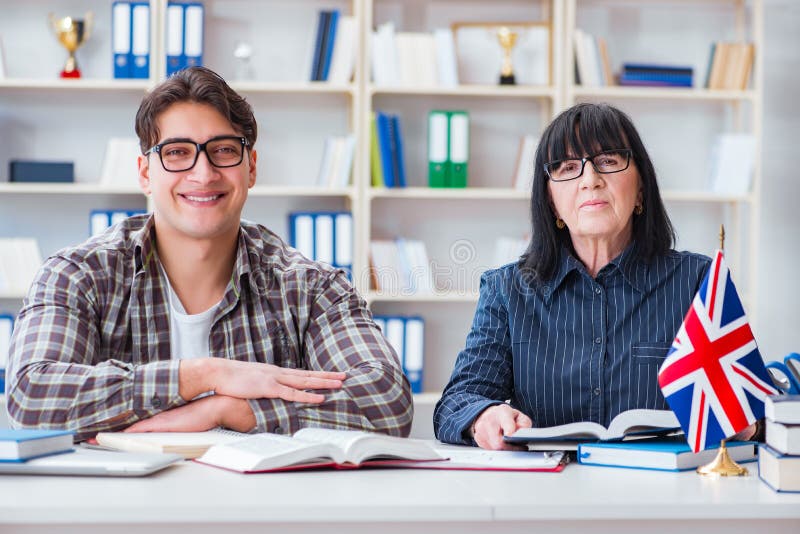 The Young Foreign Student during English Language Lesson Stock Photo ...