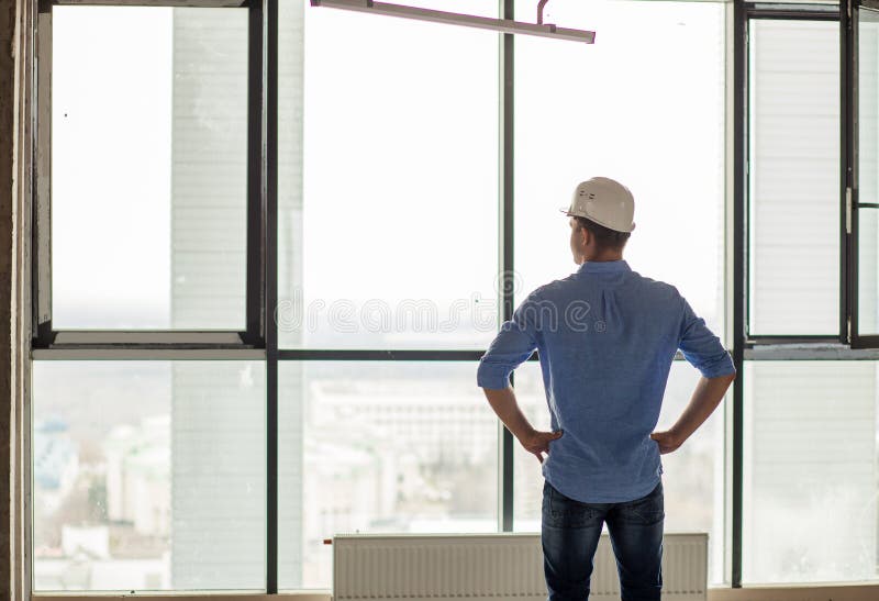 Young Foreman is Looking at the Panorama Window Stock Image - Image of ...