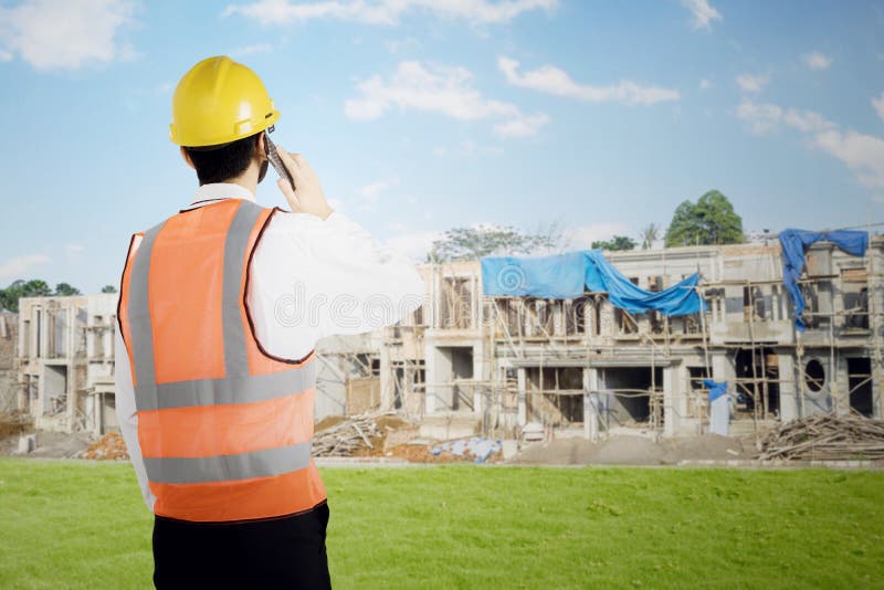 Young Foreman Speaks on the Smartphone Stock Image - Image of male ...