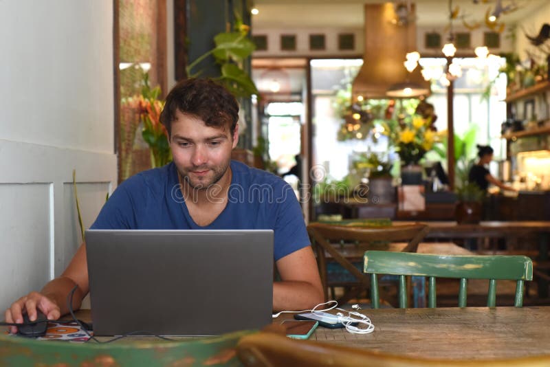 Young Freelancer Working in a Cafe Stock Photo - Image of occupation ...