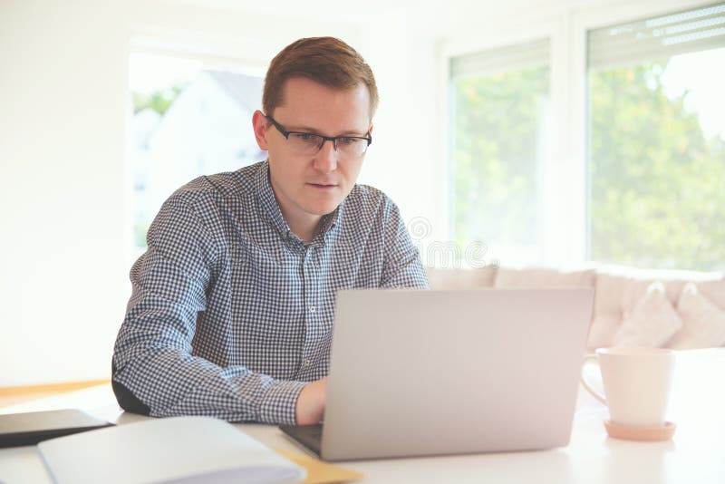 Young Freelancer Working with Laptop at Home Stock Photo - Image of ...