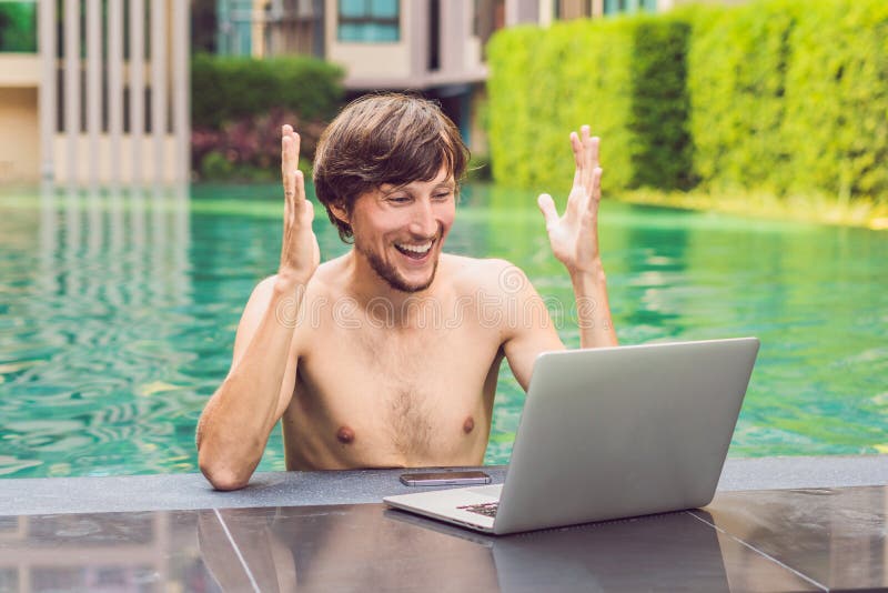 Young Freelancer Working on Vacation Next To the Swimming Pool Stock ...