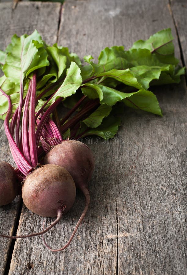 Young,fresh Beets with Tops on Old Wooden Background.Style Rustic ...