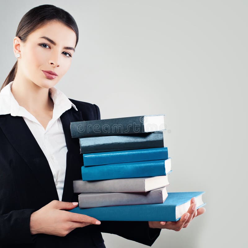 Young Friendly Girl Student with Book on Background with Copyspace ...