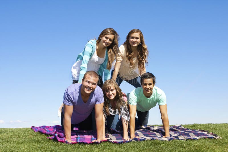 Young Friends Playing Outdoors Stock Image - Image of healthy ...