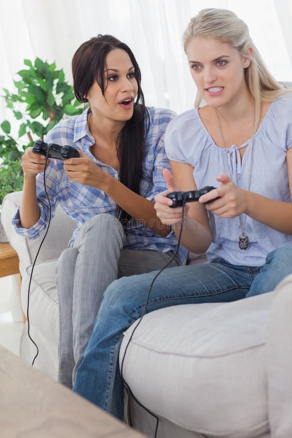 Young Friends Playing Video Games and Having Fun Stock Image - Image of ...